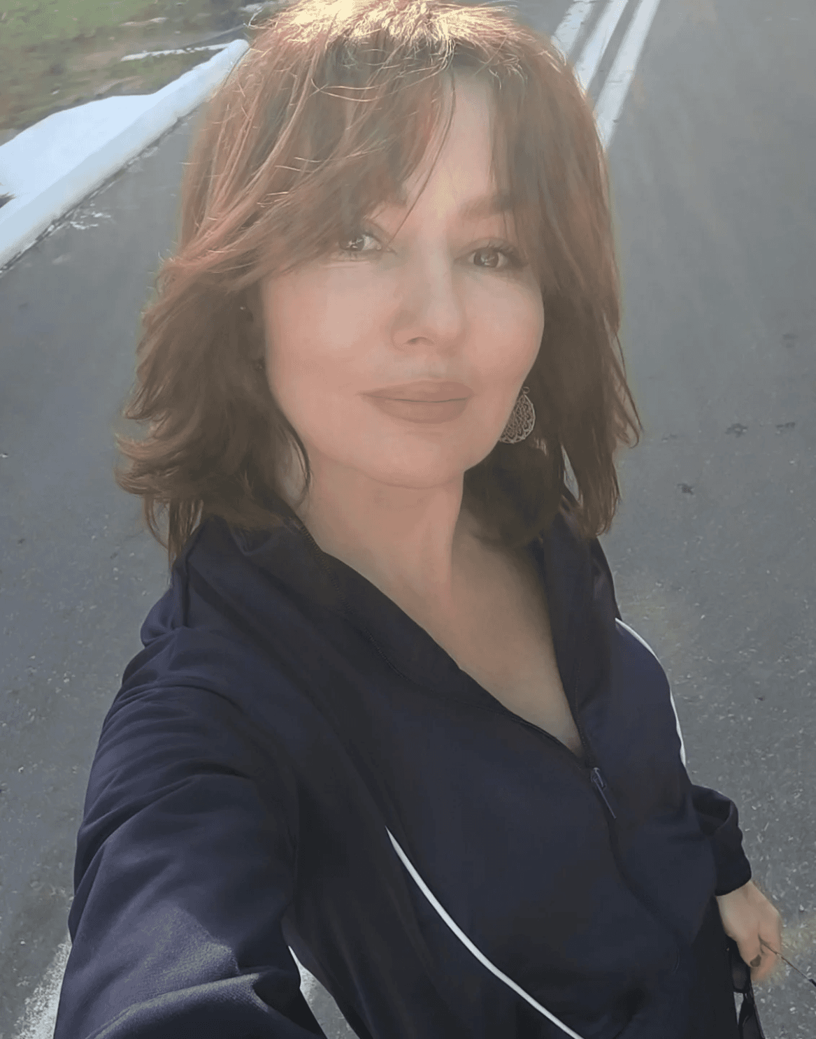 15 Layered Haircuts For Wavy Hair That Add Shape And Movement